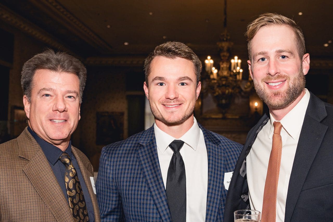 Jerry Dietz Sr. (right) hosting his sons, Kevin ’83 and Jerry ’77, as ...